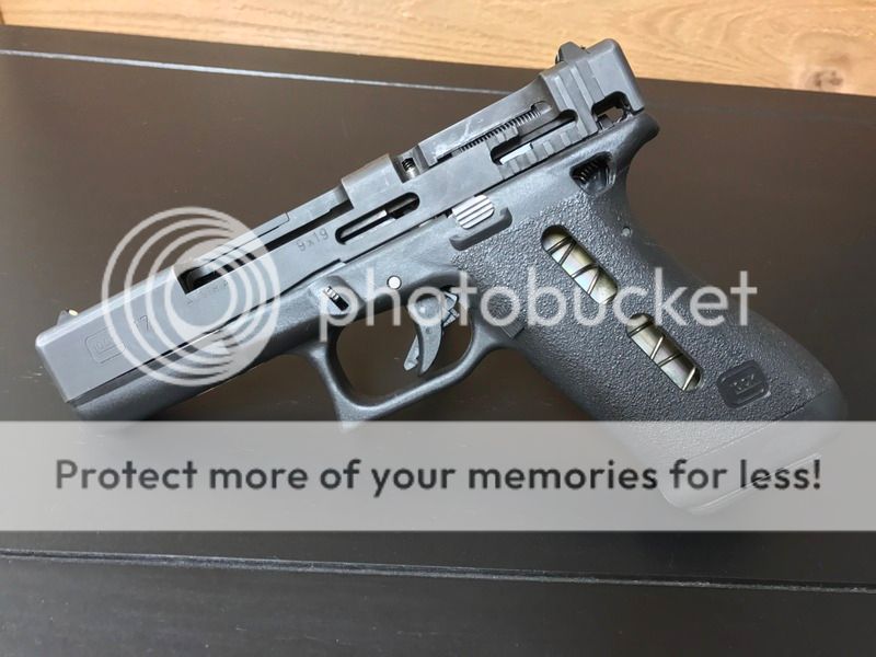Two rare Glocks, gen 1 19 and gen 1 17 cutaway. - AR15.COM
